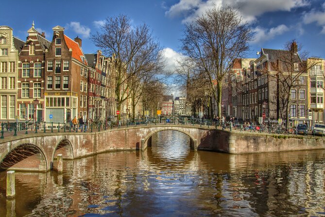 19th Century Amsterdam Guided Private Bike Tour - What to Expect at Each Stop