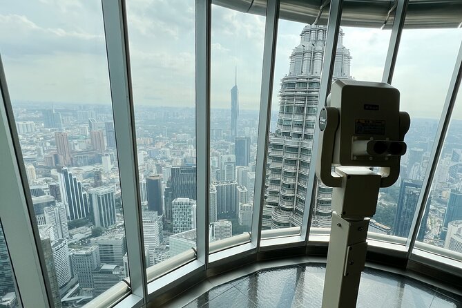 2-WAY FLIGHT: Private Kuala Lumpur guided day tour from Singapore - Evening: Final Highlights and Return Flight