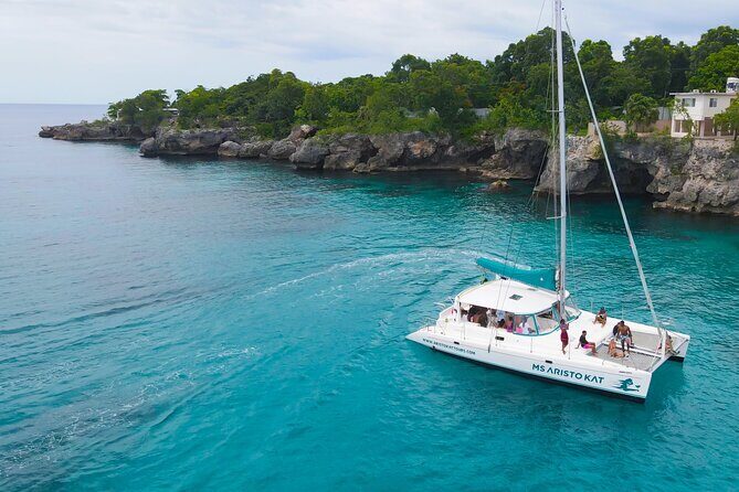 3.5hr Private Catamaran Cruise with Snorkeling, DJ, Bar, Food - Key Points