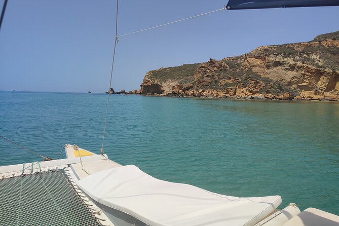 4 Hours Catamaran Tour to the Scala Dei Turchi - Skipper and Food Experience