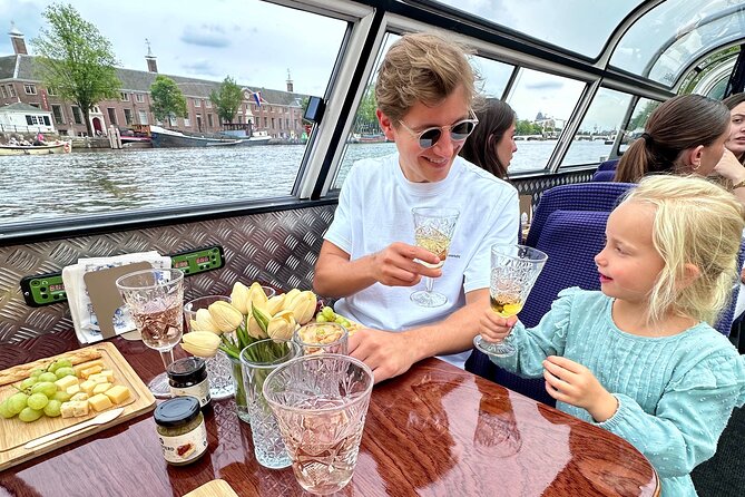 A Luxurious Cheese & Wine Canal Cruise Through Historic Amsterdam - Key Points