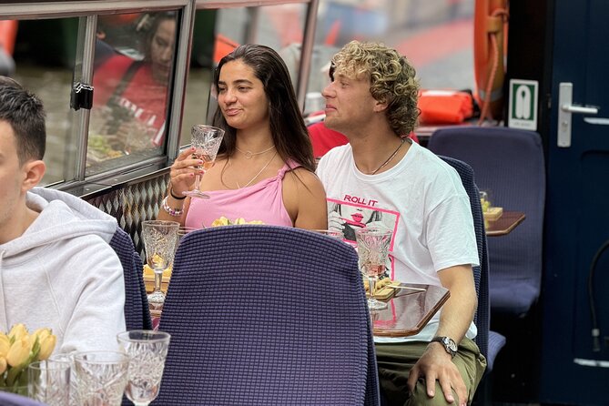 A Luxurious Cheese & Wine Canal Cruise Through Historic Amsterdam - Intimate and Relaxed Atmosphere