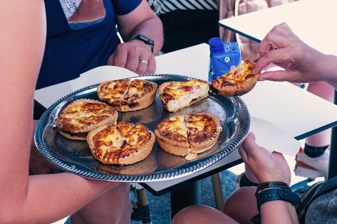 A Morning in Paris Food Tour: Croissants, Baguettes & Chocolate - Savoring French Cheeses on Artisan Baguettes