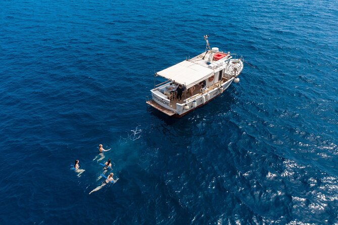 Amalfi Coast Escape With Lunch on Board, Swimming and Lots of Fun - Meeting Point and Pickup Options