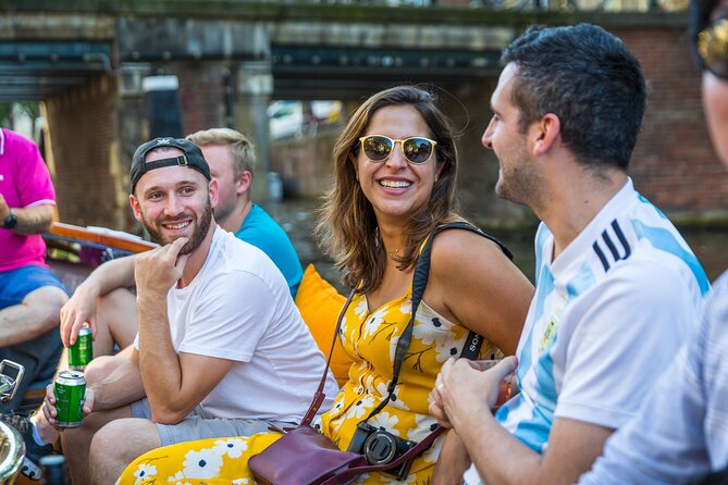 Amsterdam 1-Hour Canal Cruise With Live Guide - The Experience: Comfort, Content, and Commentary