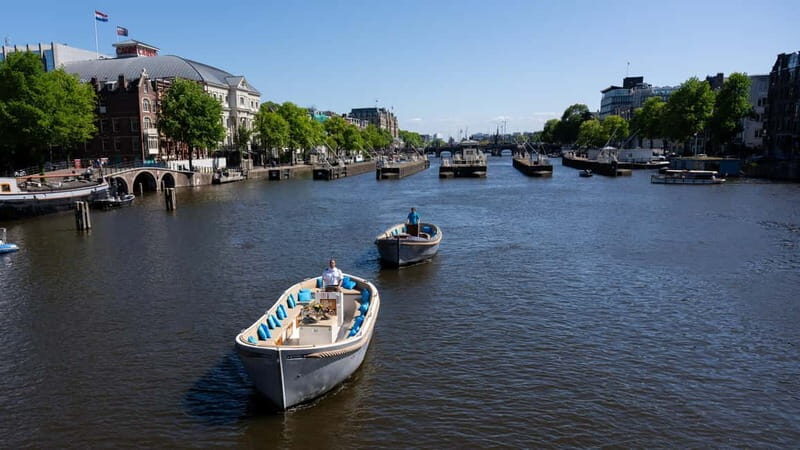 Amsterdam: Canal Cruise in Open Boat with Drink Option - A Close Look at the Experience