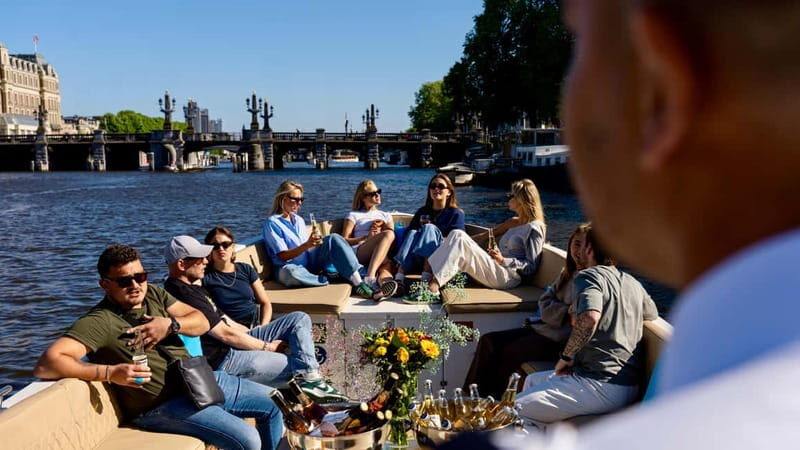 Amsterdam: Canal Cruise in Open Boat with Drink Option - Who Should Consider This Tour?