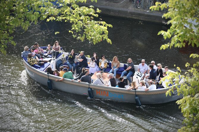 Amsterdam Canal Cruise in Open Boat with Unlimited Drinks Option - The Itinerary: Highlights and Scenic Stops
