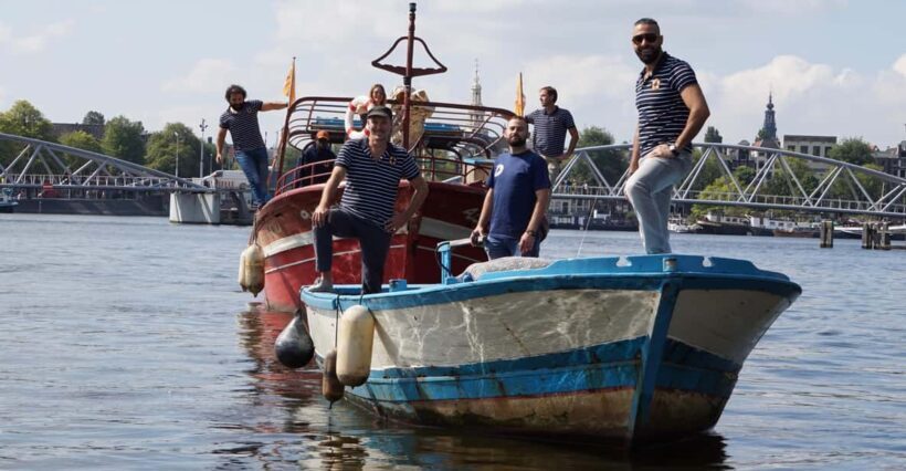 Amsterdam: Canal Cruise on a Wooden Refugee Boat - An In-Depth Look at the Refugee Canal Cruise Experience