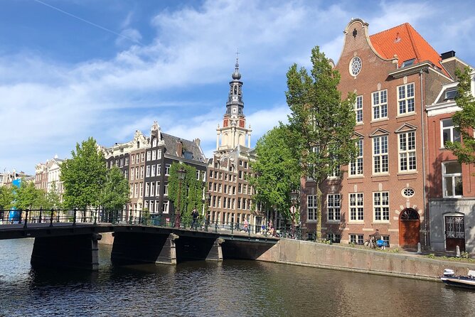 Amsterdam Canal Cruise With German Guide and Unlimited Drinks - Tour Highlights