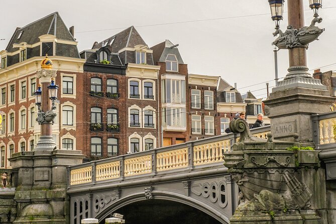 Amsterdam Canal Cruise With German Guide and Unlimited Drinks - Meeting and Pickup