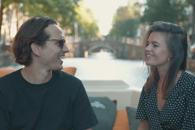 Amsterdam Canal Cruise With German Guide and Unlimited Drinks - Exploring Amsterdams Canals