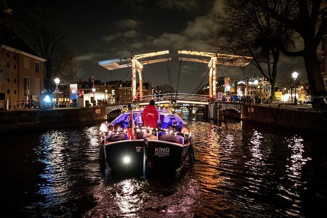 Amsterdam Canal Cruise With Live Guide and Unlimited Drinks - Practical Details and Tips