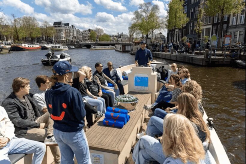 Amsterdam: City Highlights Small Boat Canal Cruise with host - The Sum Up