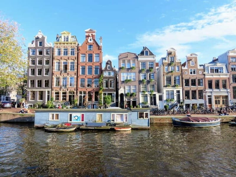 Amsterdam: City walking experience with a local - Why Travelers Rave About This Tour