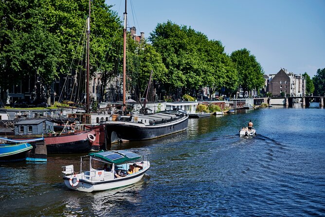 Amsterdam Essence in German: 90-Minute Waterway Trip - What to Expect on the Tour