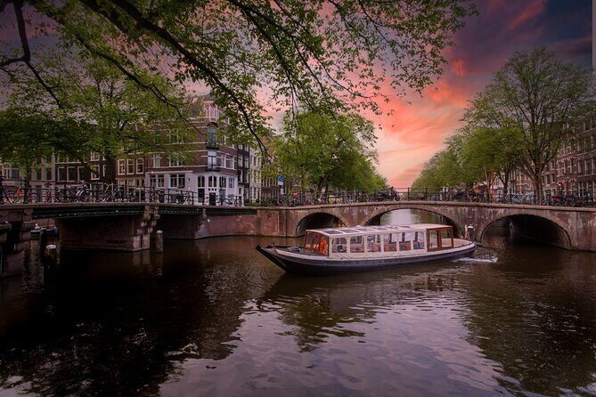 Amsterdam Evening Canal Cruise with Live Guide and Onboard Bar - The Real Experience: What You Can Expect