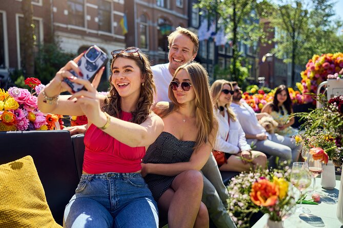 Amsterdam Flower Boat Canal Cruise With Local Guide - Key Points