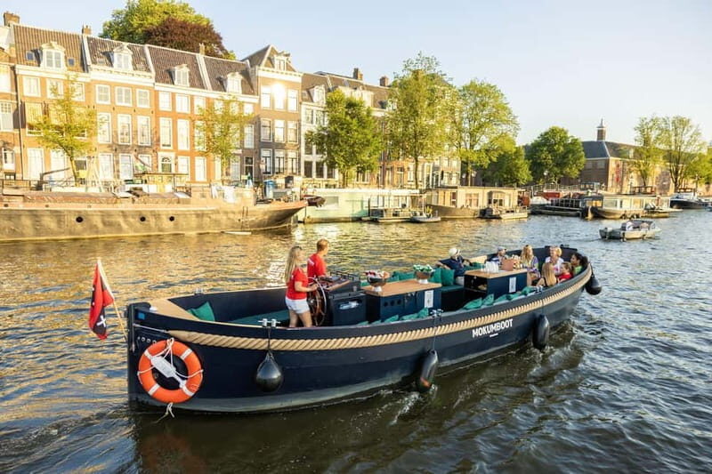 Amsterdam: Guided Open Boat Canal Cruise Including Drink - The Experience and What to Expect
