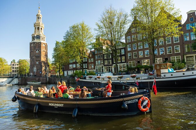 Amsterdam: Guided Open Boat Canal Cruise With Drinks Option - Inclusions and Amenities