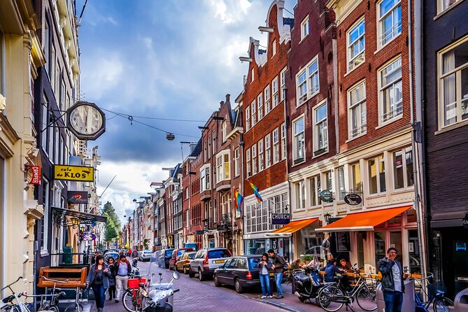 Amsterdam Highlights and History Walking Tour - Amsterdams Transformation From Fishing Village to Trade Center