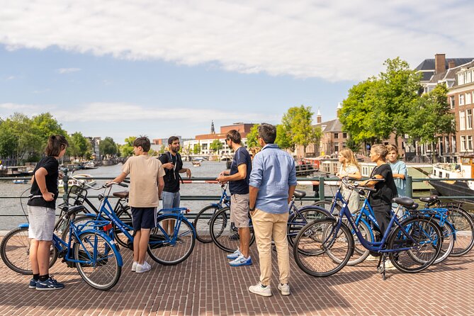 Amsterdam Highlights Bike Tour With Optional Canal Cruise - Visiting Iconic Landmarks