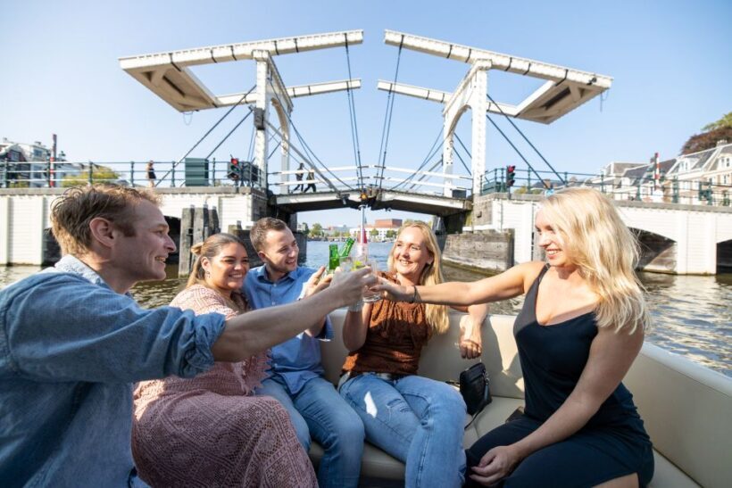 Amsterdam: Historic Boat Cruise with open bar and nibbles - The Sum Up