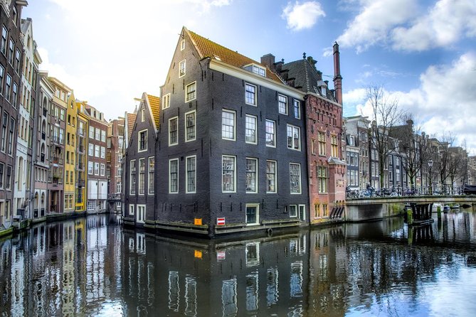 Amsterdam Layover: Walking Tour & Canal Cruise + Airport Transfer - Who Should Consider This Tour?