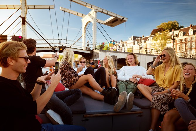 Amsterdam Light Festival: All-In Canal Cruise Covered Saloon Boat - Detailed Cruise Experience