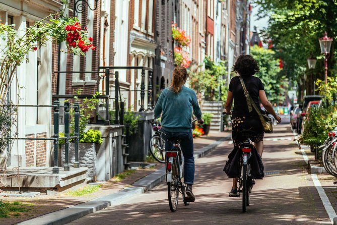 Amsterdam PRIVATE Bike Tour With Locals: Bike & Local Snack Included - Traveler Feedback and Reviews