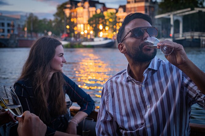 Amsterdam Private Dinner Cruise With Drinks and 2-course Dinner - The Sum Up