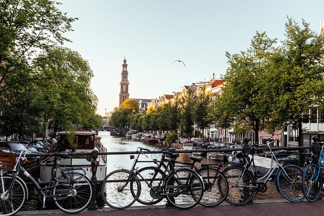 Amsterdam Private Tour: Highlights & Hidden Gems by Bike or Foot - Meet Your Knowledgeable Local Guides