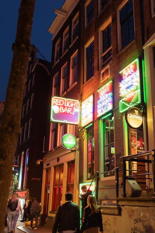 Amsterdam: Red Light Tour Exclusive + Peep Show - Key Points