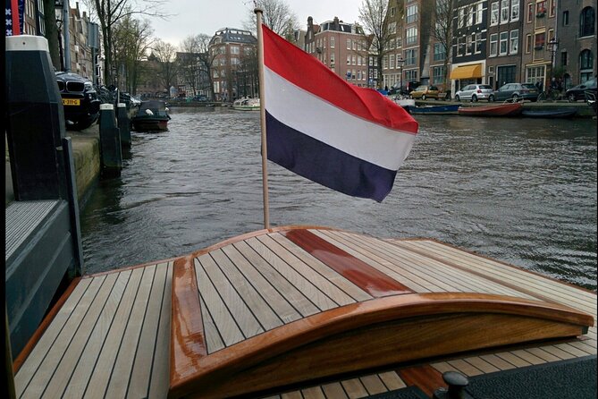 Amsterdam Small-Group Canal Cruise in 1920S Saloon Boat - Onboard Comforts and Amenities