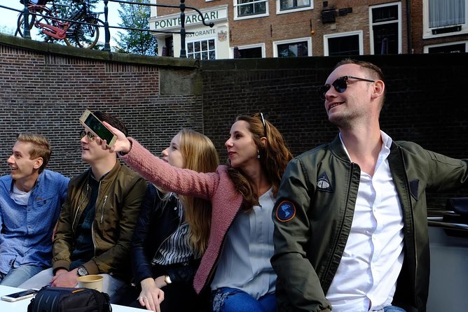 Amsterdam Small-Group Canal Cruise Including Snacks and Drinks - The Experience: What Travelers Say