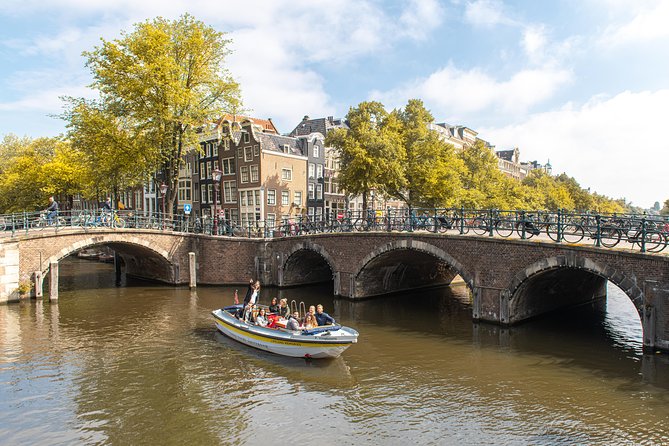 Amsterdam Small-Group Open Boat Tour With Local Guide - Experience Highlights
