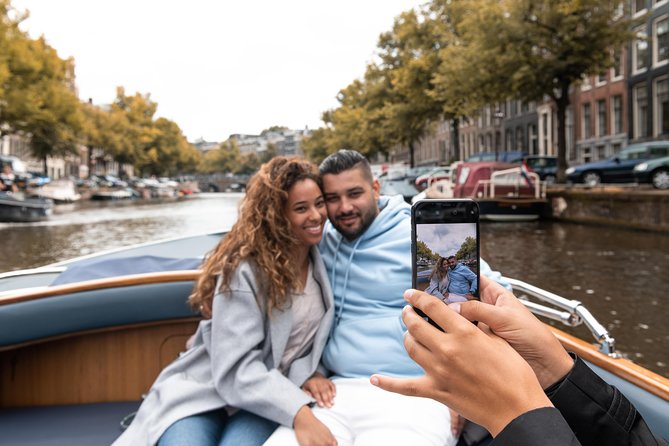 Amsterdam Small-Group Open Boat Tour With Local Guide - Pricing and Packages