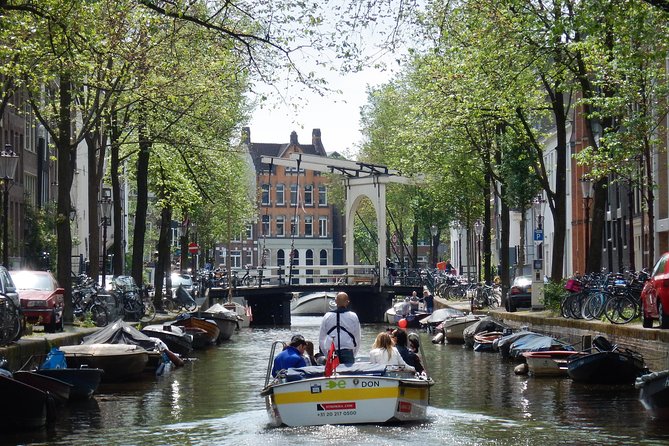 Amsterdam Small-Group Open Boat Tour With Local Guide - Tour Guide Expertise
