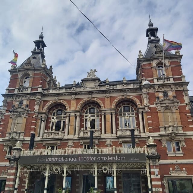Amsterdam: Spanish Tour Unmasking the Redlight District - Oude Kerk: The Oldest Building