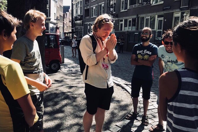 Amsterdam Walking Tour With a Local Comedian as Guide - Meeting Point and Accessibility
