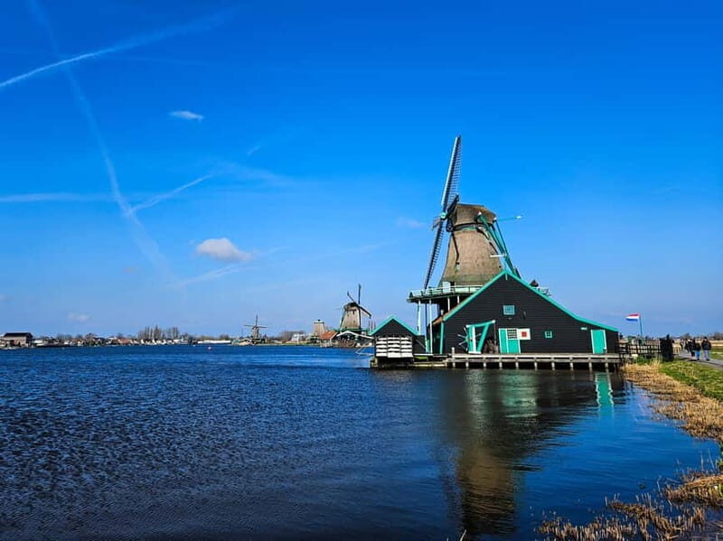 Amsterdam: Zaanse Schans windmills & Volendam Guided Tour - Key Points