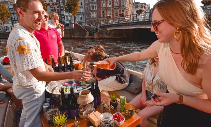 Amsterdam:1.5-Hour Canal Cruise local Guide, Drinks & Snacks - Key Points