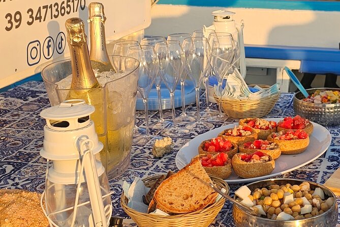 Aperitif on a boat at sunset in Palinuro - The Sum Up