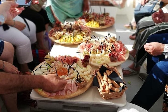 Aperitif on the Boat at Sunset Island and Sea Caves - Booking Your Sunset Cruise