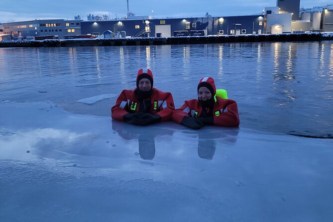 Arctic Ice Floating in Warm Survival Suit Tromsø - Essential Gear and Clothing for Maximum Comfort
