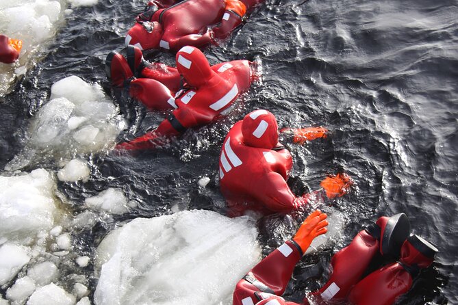 Arctic Ice Floating in Warm Survival Suit Tromsø - Meeting and Pickup Information