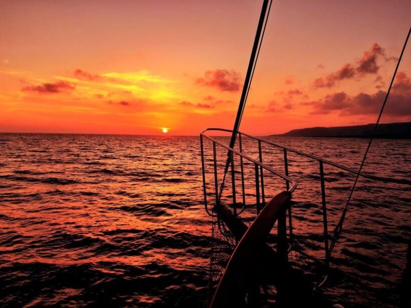 Argostoli: Sunset Cruise with Swim Stops, Dinner, and Wine - Key Points