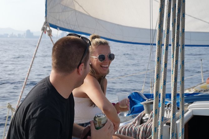 Authentic Barcelona Sailing Tour: Local Boats, Swim & Drinks - Boat and Crew