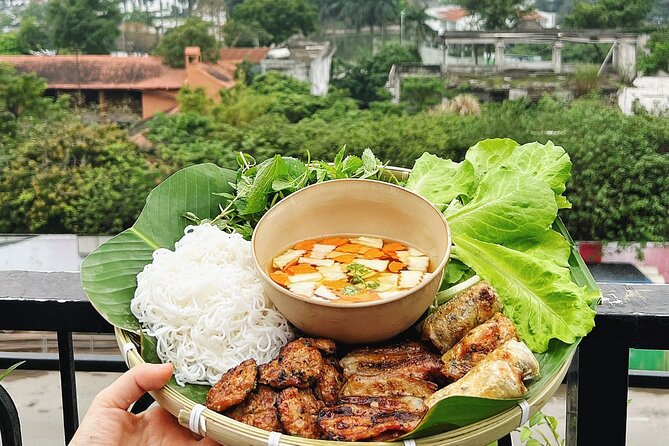 Authentic Bun Cha Hanoi making - with skyline view of Westlake - A Deep Dive into the Experience