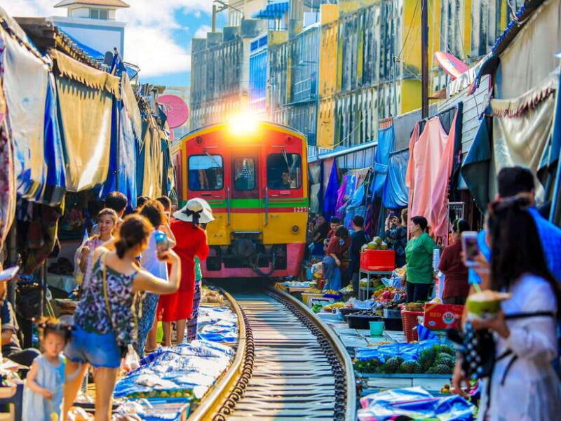 Bangkok: Maeklong Railway & Amphawa Floating Market Day Trip - Discovering the Maeklong Railway & Amphawa Floating Market Day Trip